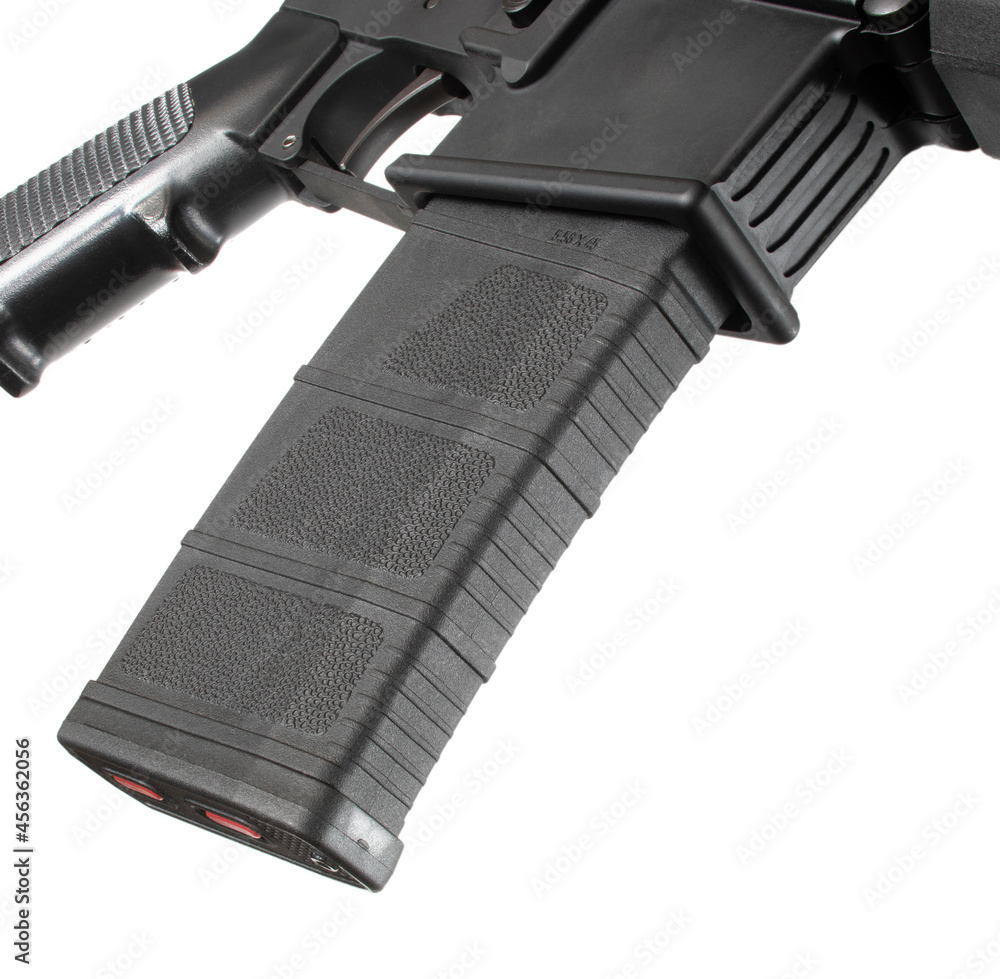 High capacity magagine inserted in an assault rifle Stock Photo | Adobe ...