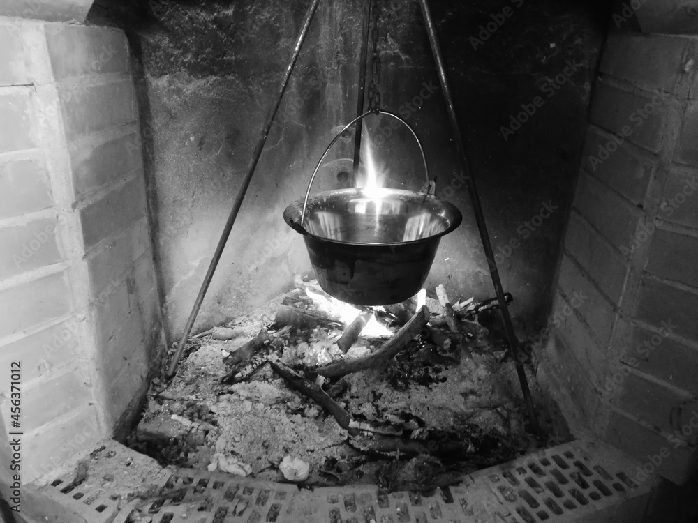 preparing cabbage for cooking in the traditional way in a cauldron ...