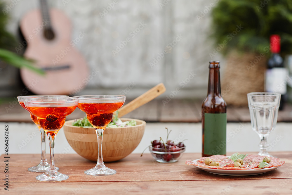 Background image of cocktail and appetizers setup at rooftop party ...