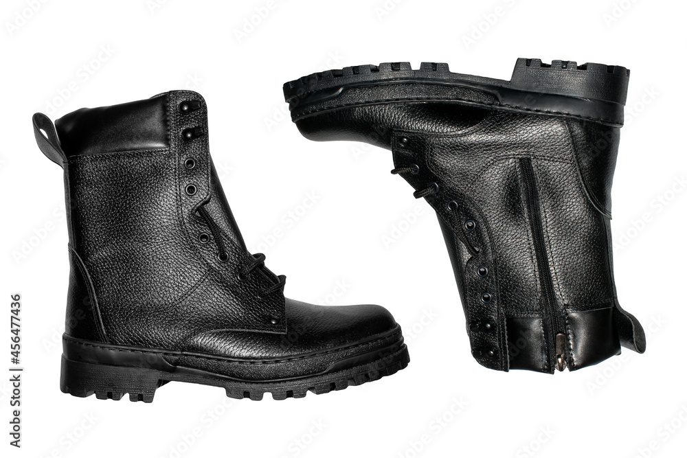 Black leather army boots on a white background.New military boots on a ...