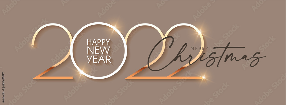 Happy new 2022 year! Elegant gold text with light. Minimalistic soft ...