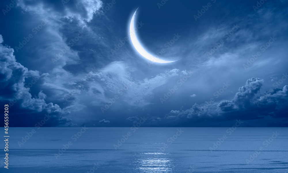 Crescent moon over the tropical sea at night "Elements of this image ...