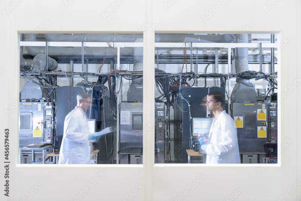 Scientists in lithium ion battery test facility in battery research ...