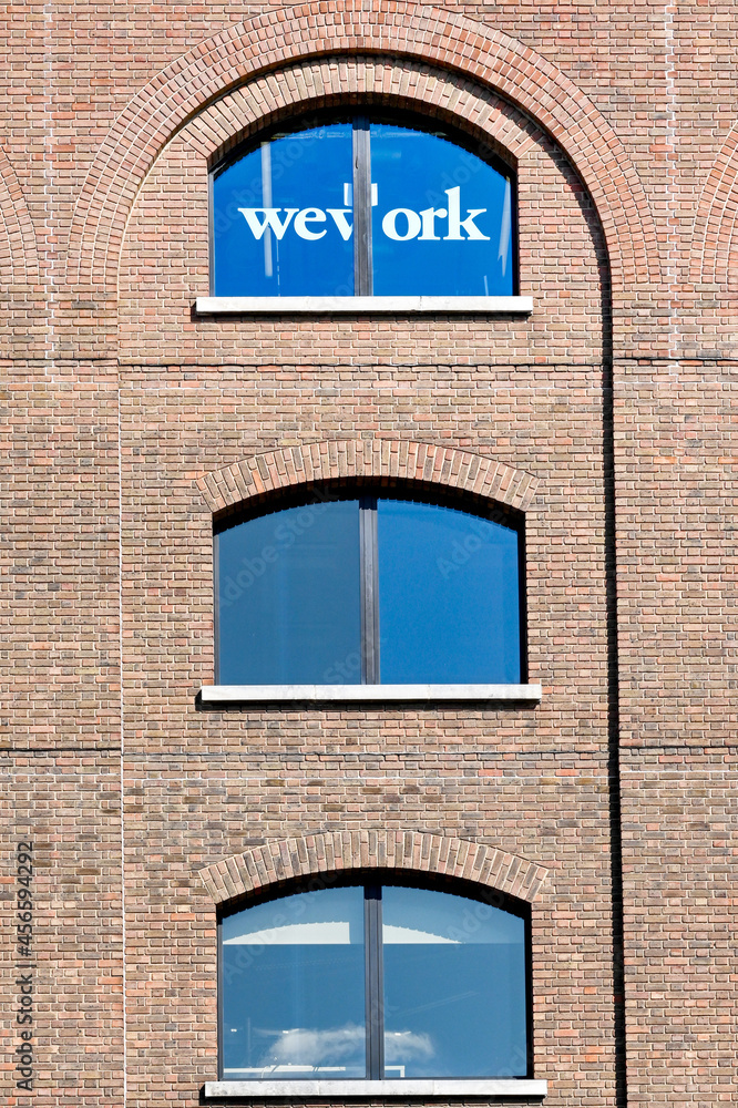 London, England - August 2021: Sign on one of the windows of an office ...