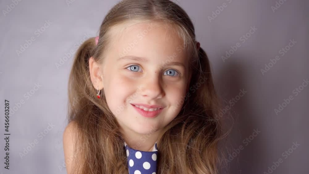 Portrait cute Little Girl Looking at Camera. Young Laughs Happily Child ...