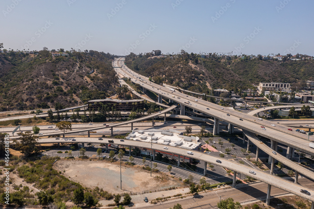 Commuters drive on San Diego Freeways. Busy California highways, aerial ...
