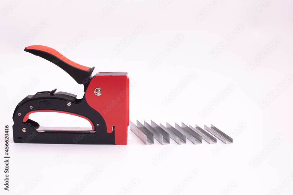 stapler gun and staples to it on a white background. mock up Stock ...