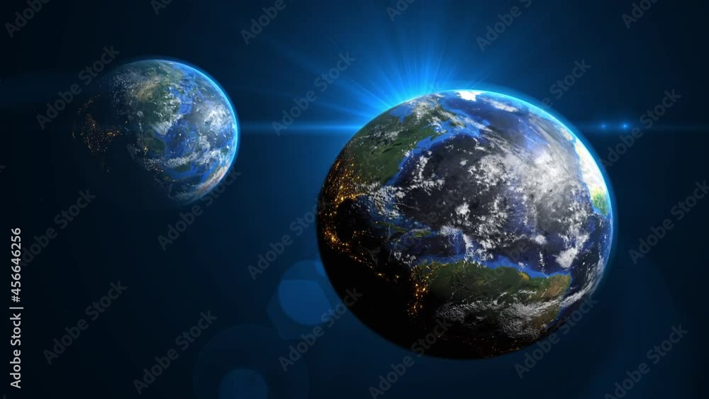 Blue sunrise on the two earth rotate in space with star in universe ...