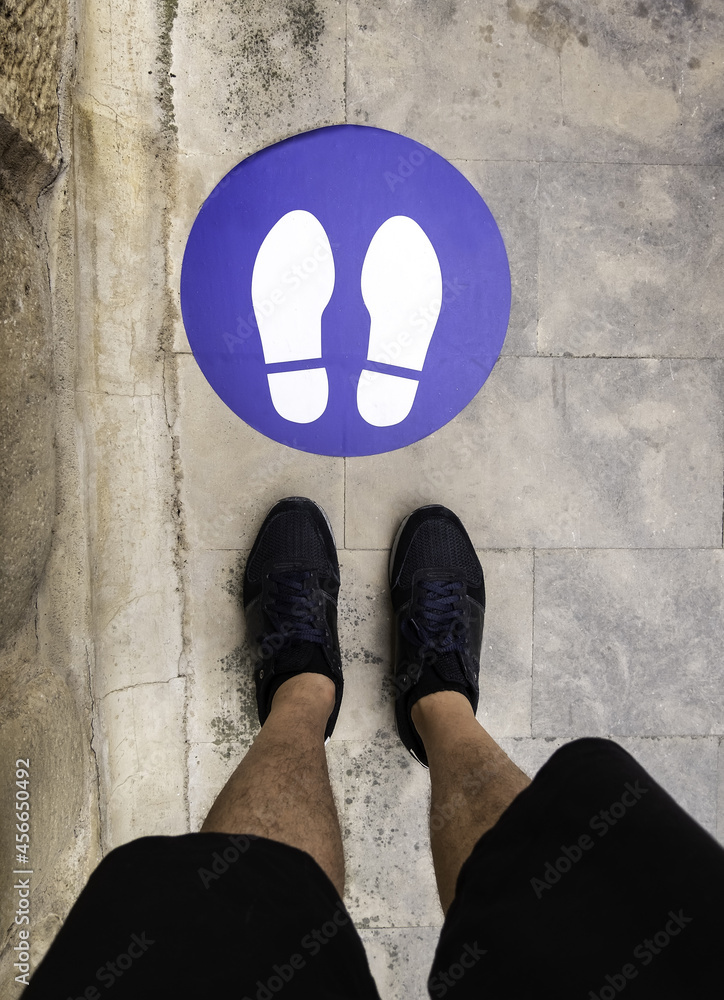 Feet with foot sign Stock Photo | Adobe Stock