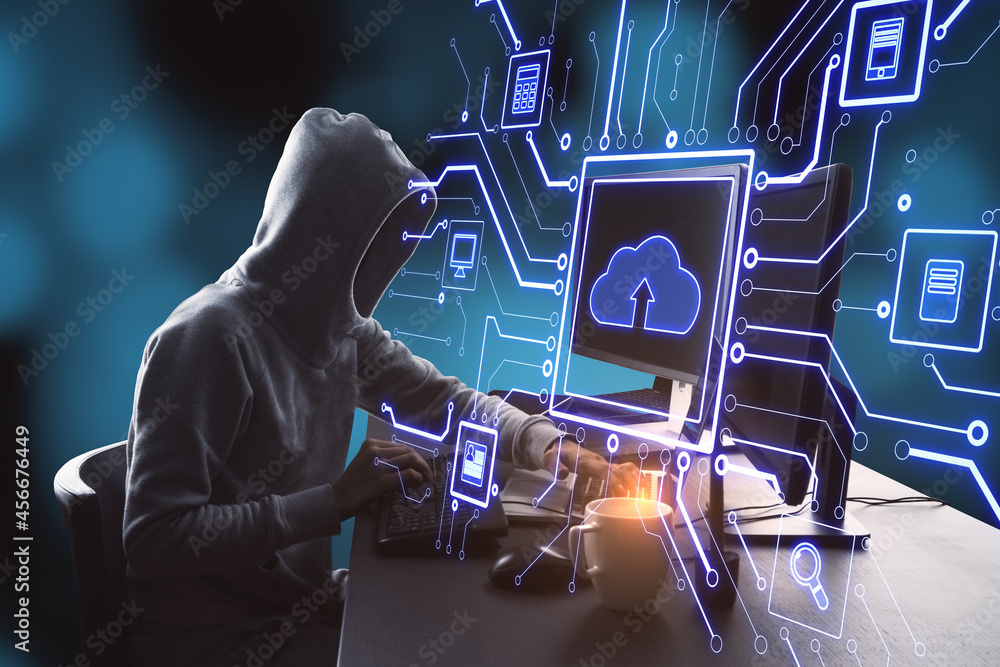 Hacker At Desktop Using Computers With Abstract Glowing Circuit Cloud Computing Interface On