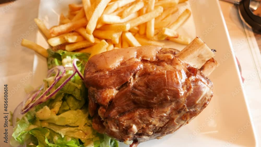 Slow pan over the traditional Aslatian German dish Ham hock - pork ...