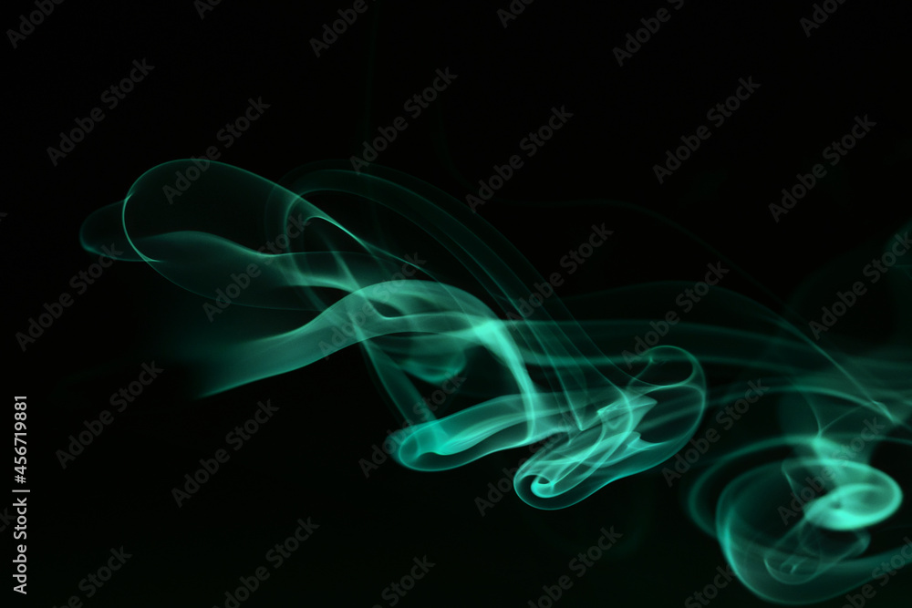 Abstract colored smoke moves on dark background. Wallpaper. Personal ...