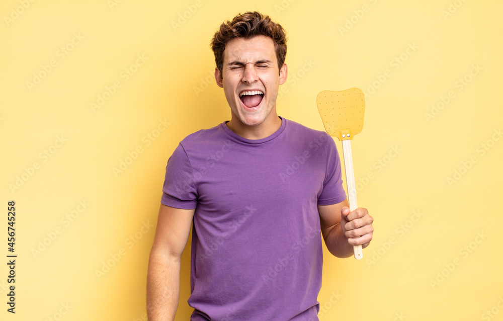 shouting aggressively, looking very angry, frustrated, outraged or ...