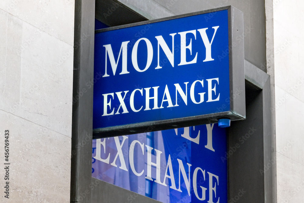 Sign above the entrance to a currency exchange shop Stock Photo | Adobe ...