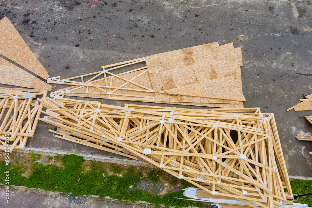 Stacker wooden material boards and beams for new house on of under ...