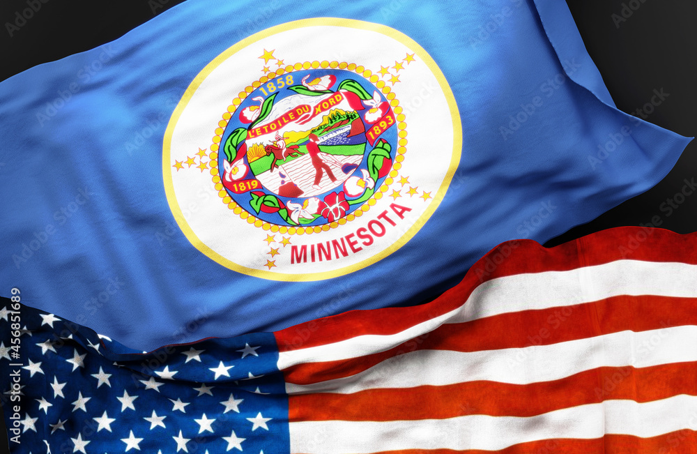 Flag of Minnesota along with a flag of the United States of America as ...