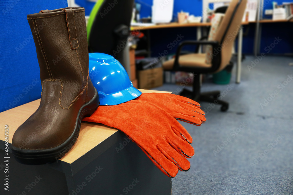 Safety shoes to protect the feet. Helmet to protect the head. Leather ...