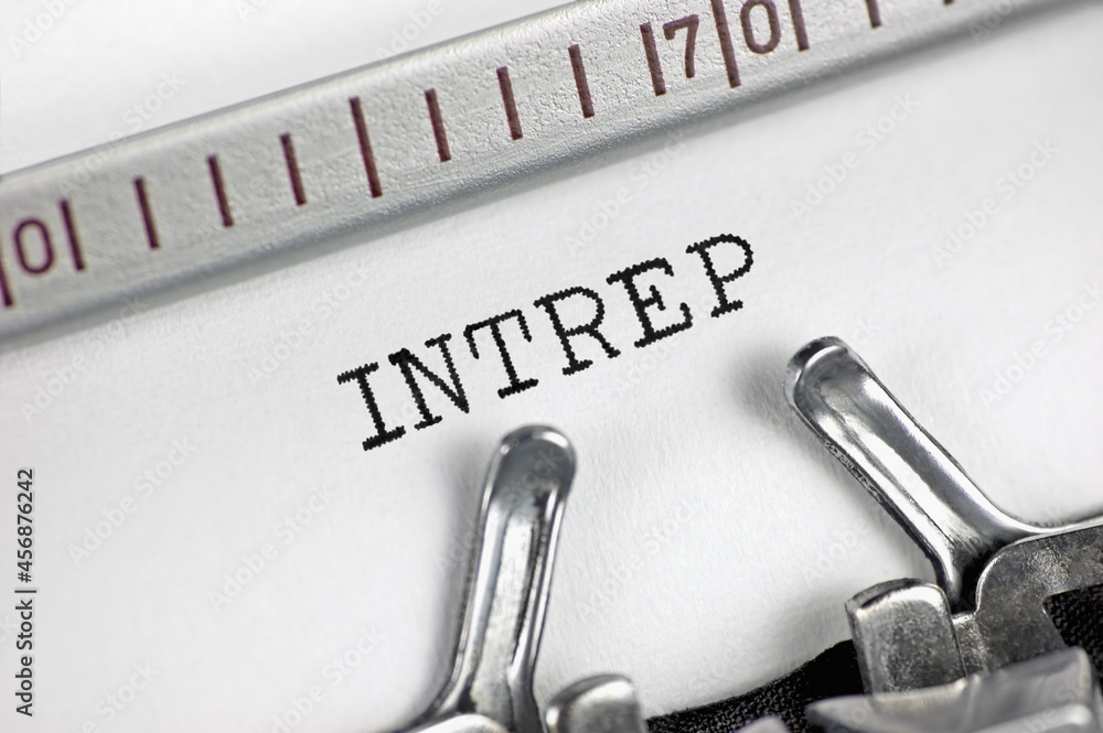Intelligence report acronym INTREP text macro closeup, typewriter typed ...