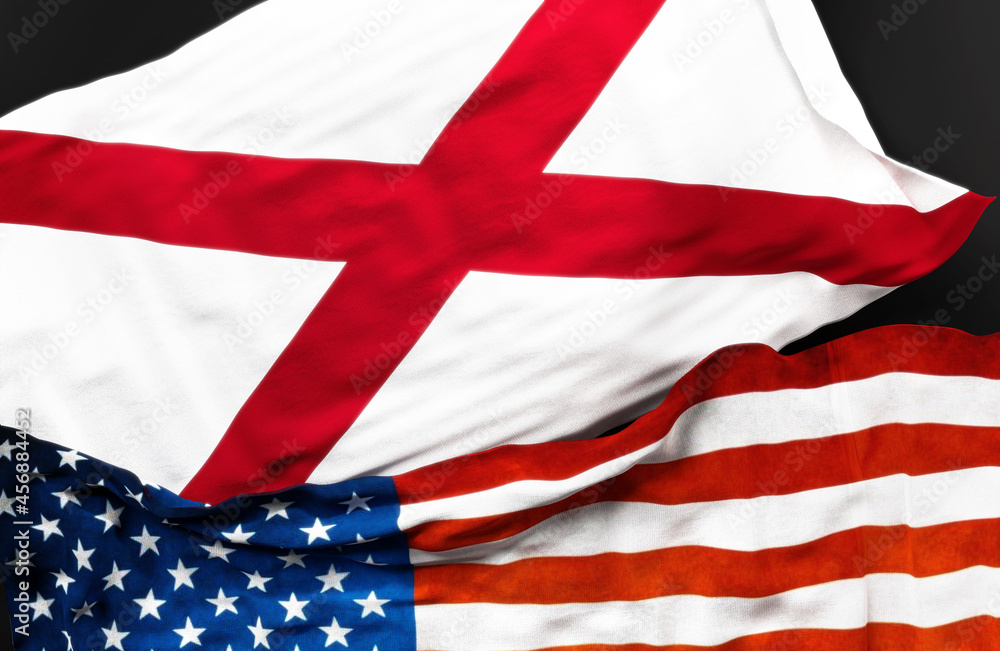 Flag of Alabama along with a flag of the United States of America as a ...