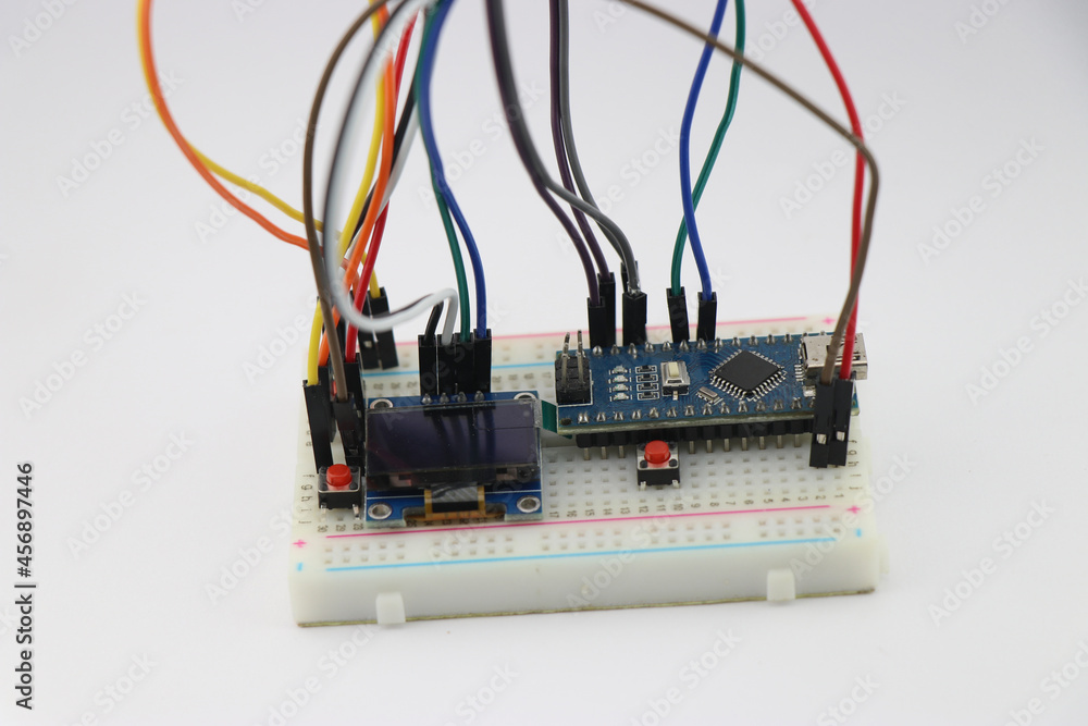 Breadboard circuit made from display module and microcontroller board ...
