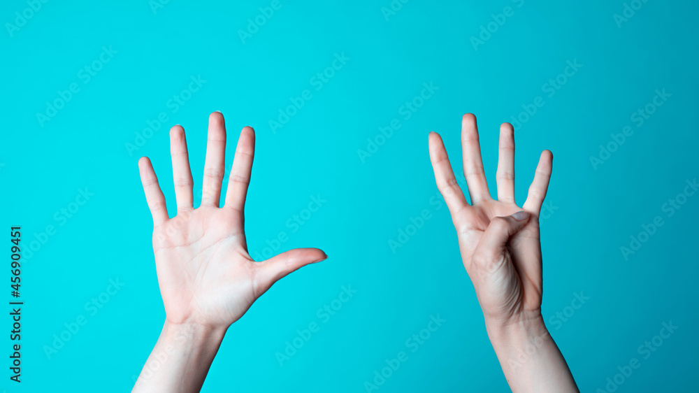 Beautiful White Female Hands Holding Up Nine Fingers Signaling the ...