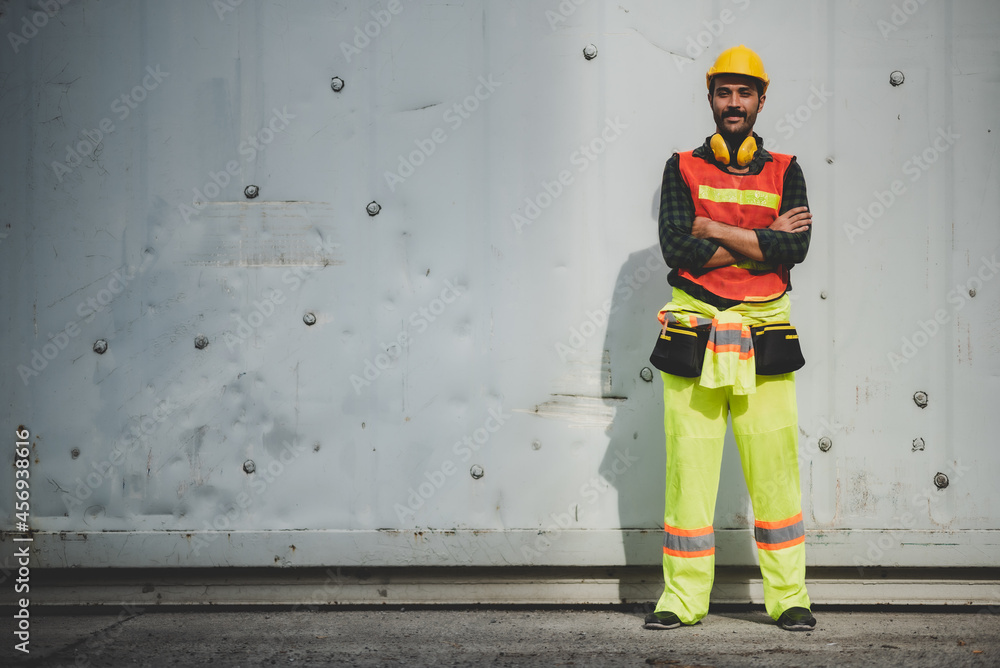 foreman or engineer are work in container shipping industry warehouse ...