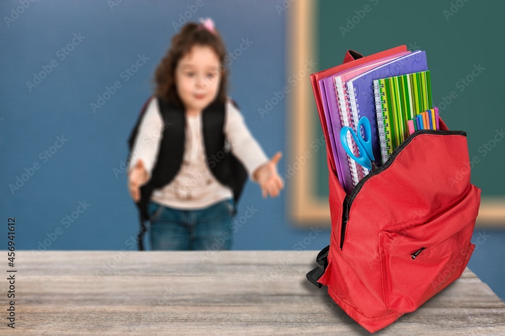 Cute child get ready for school with a backpack for school day ...