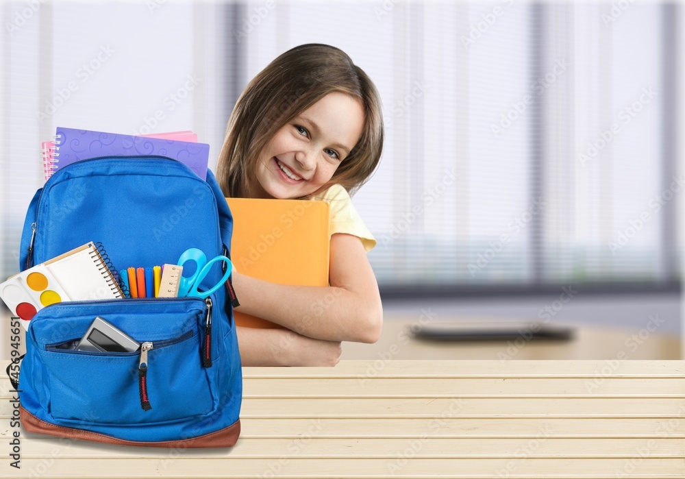 Cute child get ready for school with a backpack for school day ...