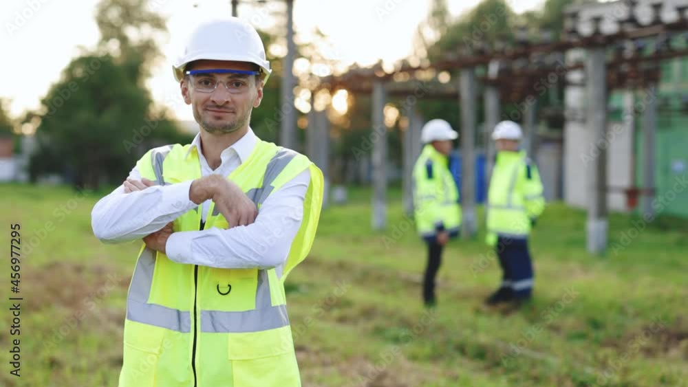 Portrait of engineer. Professional electrical industry engineer smiling ...