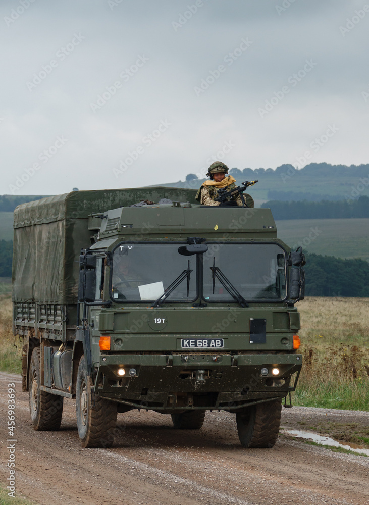 British army SV 4x4 logistics truck support vehicle with armed spotter ...