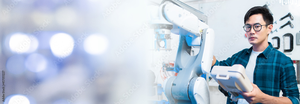 Male Engineers Maintenance Robot Arm at Lab. he are in a High Tech ...