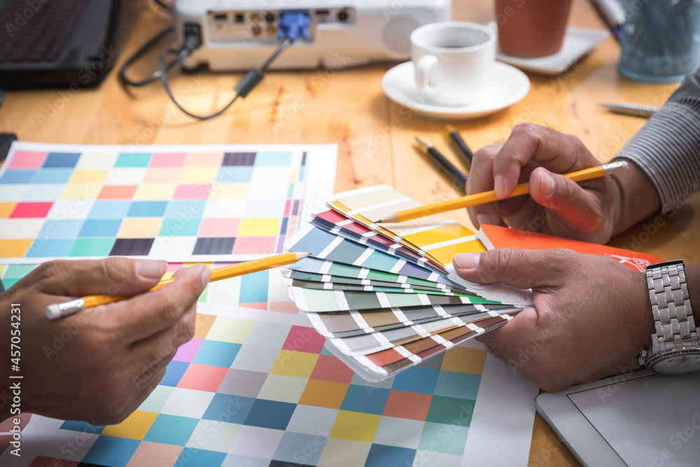 Interior designer chooses a color chart for home design. Graphic ...