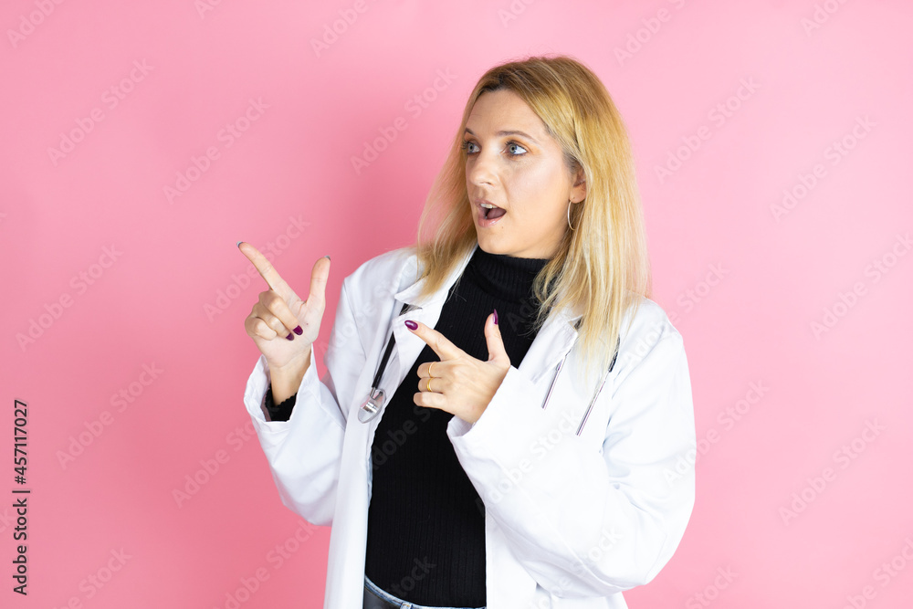 scared with her arms up like something falling from above Young blonde ...