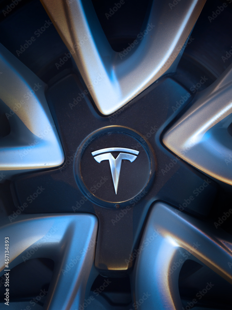 Tesla logo on Tesla Model 3 rim, closeup Stock Photo | Adobe Stock