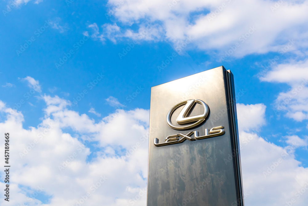 Lexus brand logo on blue sky background, emblem, symbol close-up Stock ...