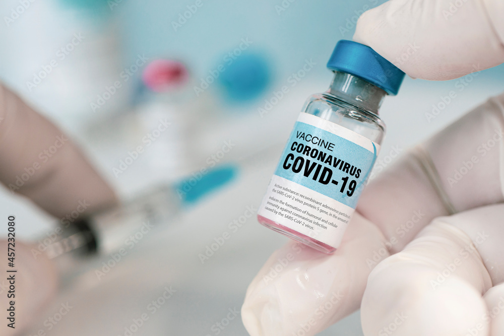 Closeup of syringe and injection coronavirus, covid-19 vaccine disease ...