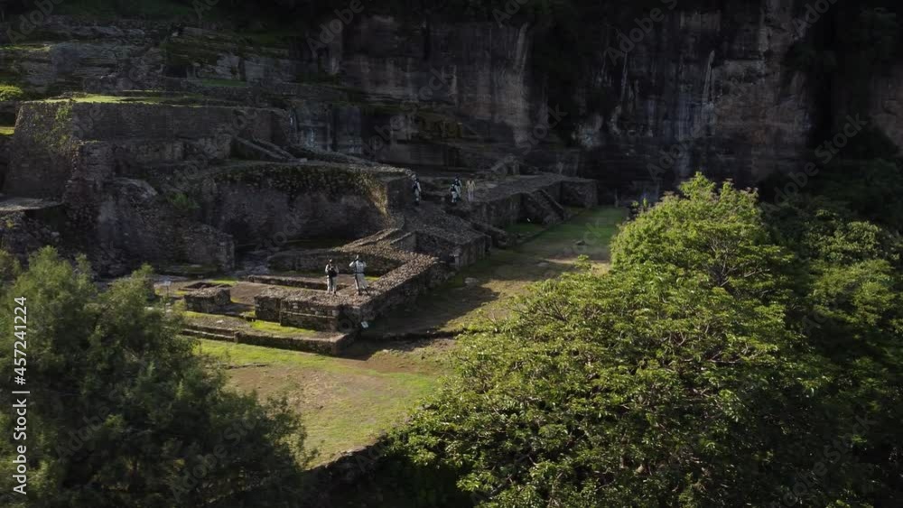 A troop of Mexican soldiers patrolling the old Aztec ruins located in ...