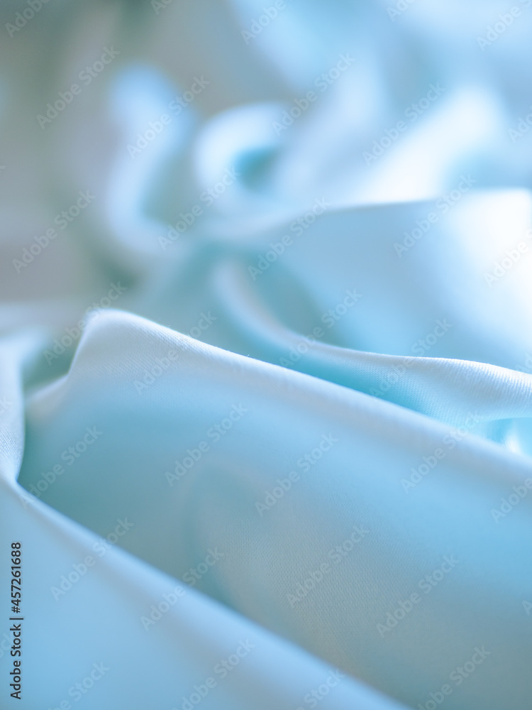 Soft fabric with beautiful folds of light color in a blur. Stock Photo ...