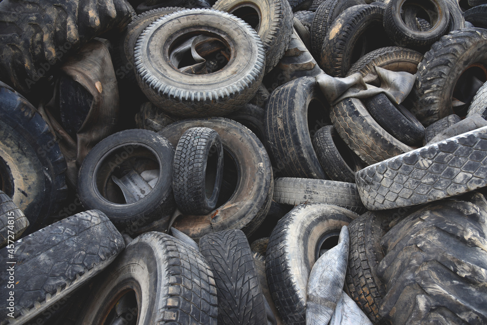 Landfill with old tires and tyres for recycling. Reuse of the waste ...