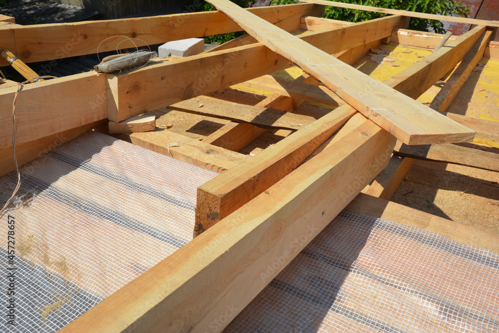 Roofing construction. A close up of roof wood framing with ceiling ...