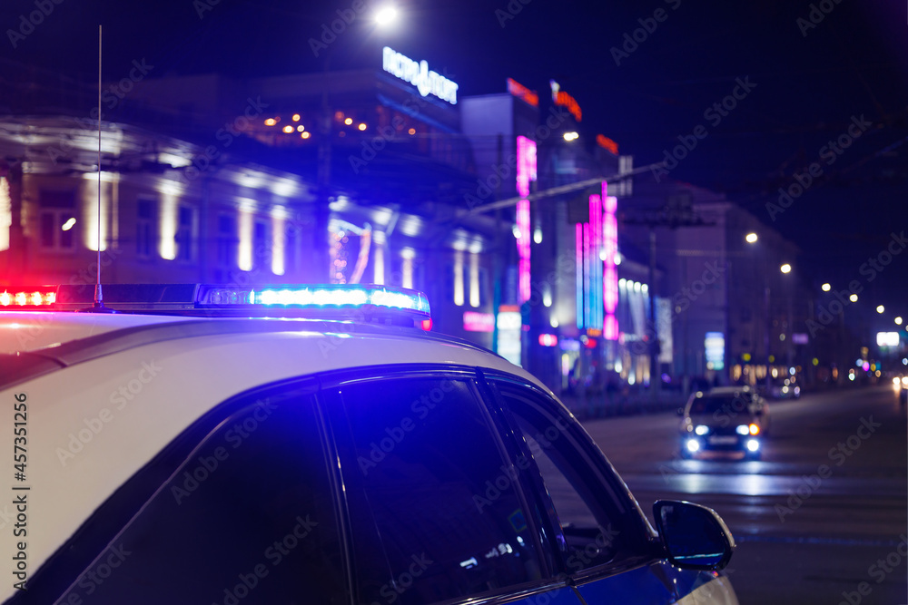 police car lights in night city with selective focus and bokeh Stock ...