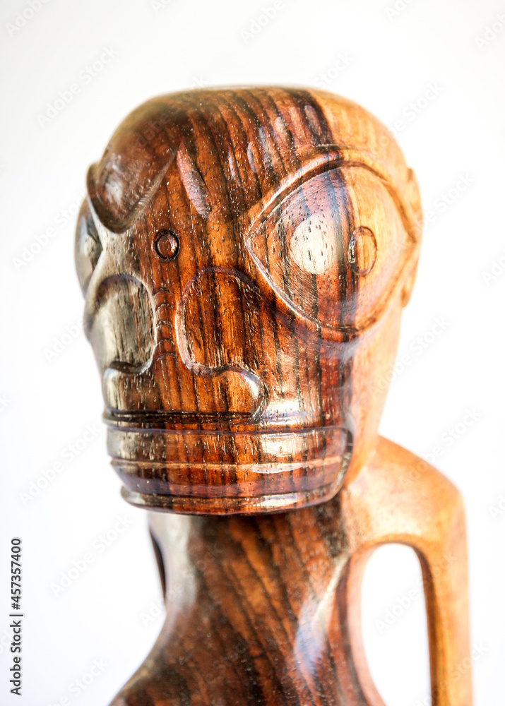 traditional wooden Polynesian tiki from Marquesas Islands. White ...