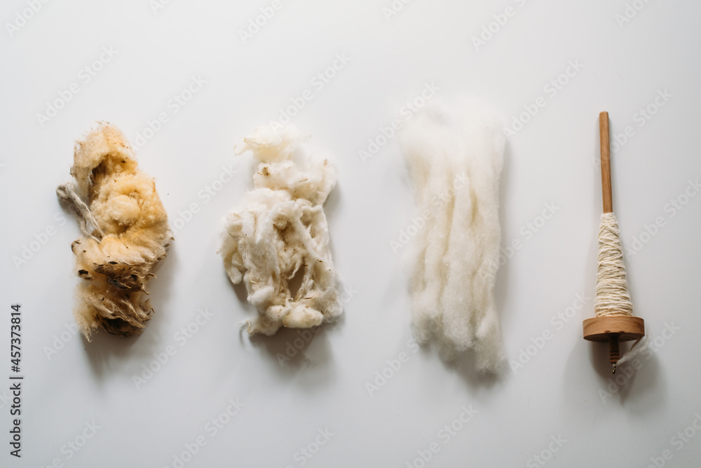 Four stages: raw wool, washed wool, combed wool and yarn Stock Photo ...