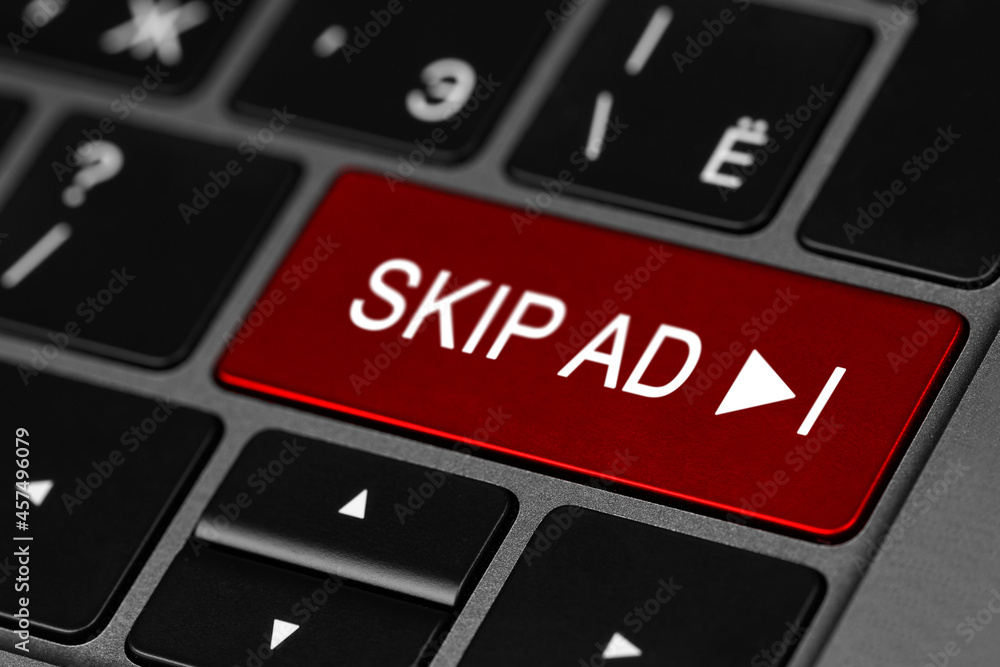 red button with text SKIP AD closeup keyboard Stock Photo | Adobe Stock