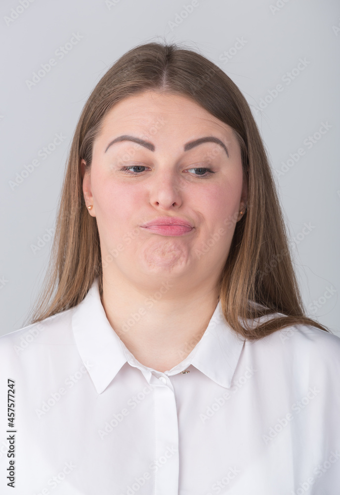 Discontented overweight woman portrait. Unsatisfied emotion. Displeased ...