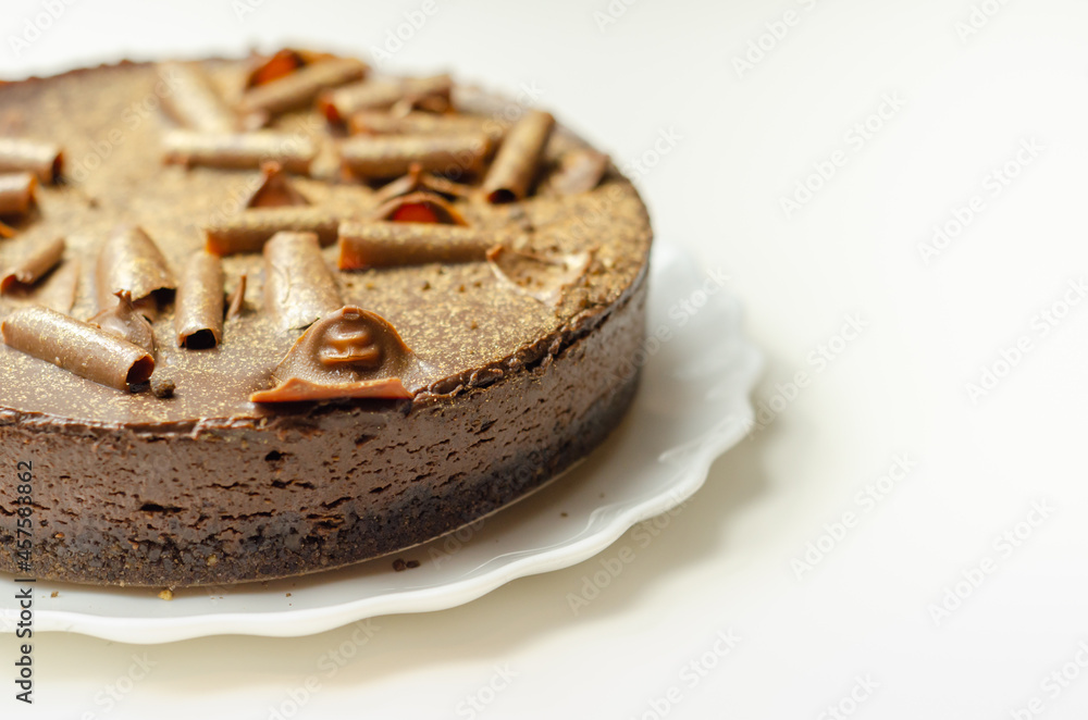 Digestive biscuit base with chocolate cheesecake and pockets of salted ...