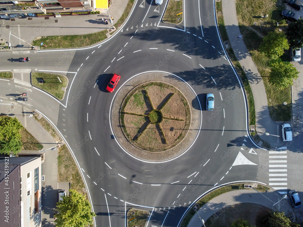 Aerial drone view of roundabout in the city. Traffic on roundabout in ...