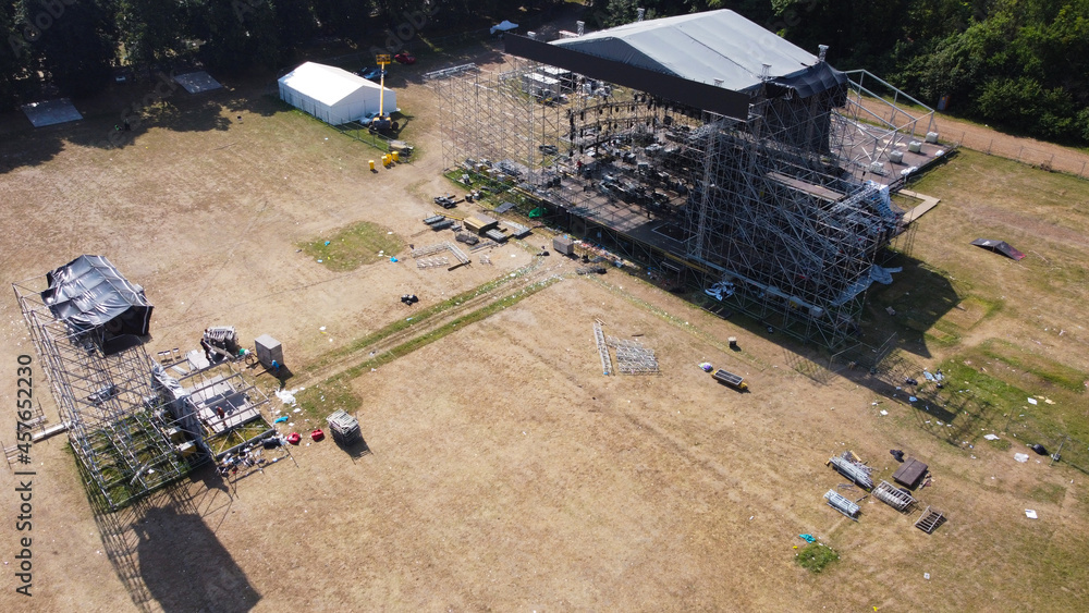 workers build a concert stage. Concept High-rise works. metal designs ...