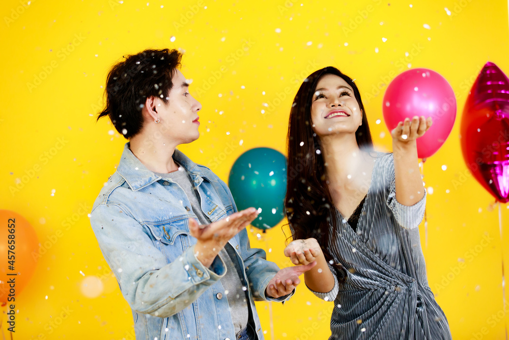 Studio shot of Asian happy young male and female lover couple model in ...