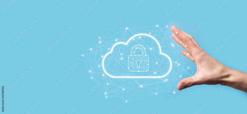 Business man hold,holding cloud computing data and security on global ...